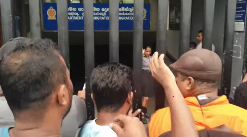 Argument between two groups in front of Kandy Immigration and ...